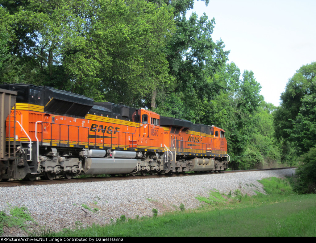 BNSF ES44' and ACe lead a heavy coal train eastbound